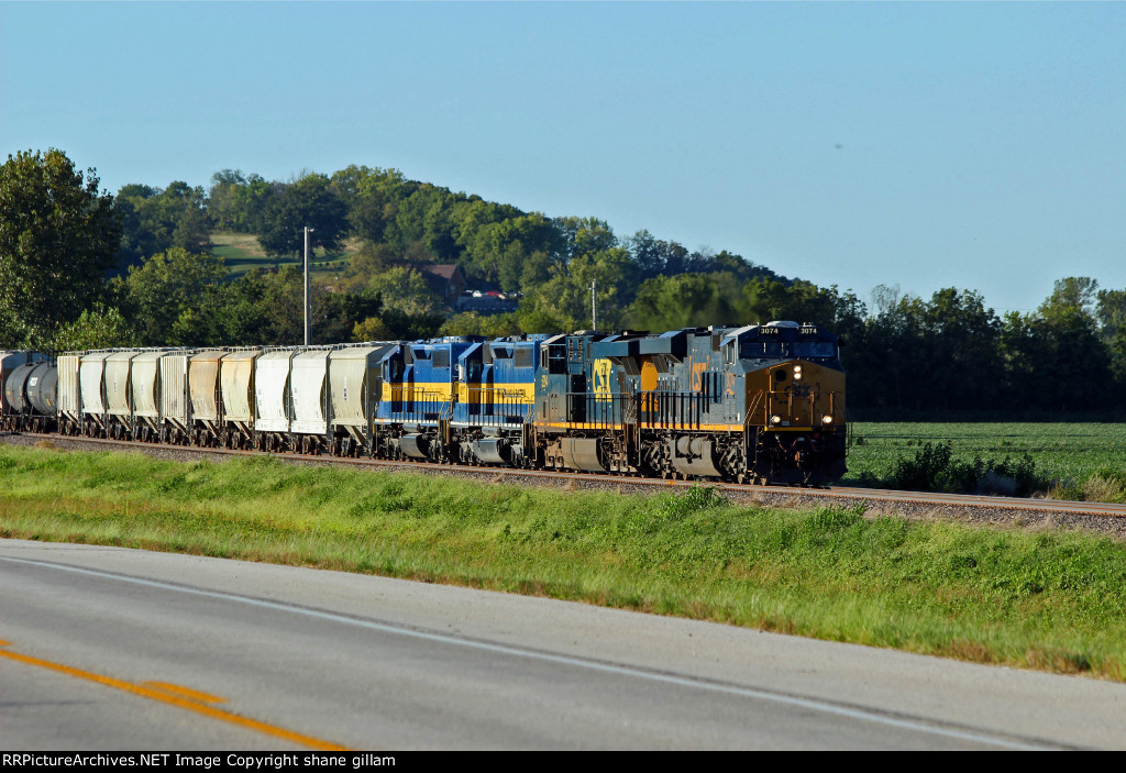 CSX 3074 Strolls a freight Sb with ICE and DME in tow.